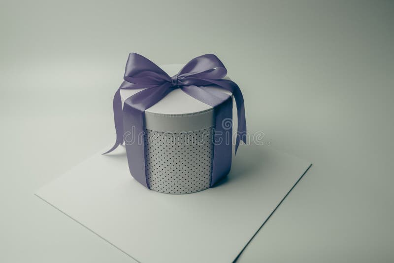 Round Gift Box with Purple Ribbon on Top Stock Image - Image of party ...