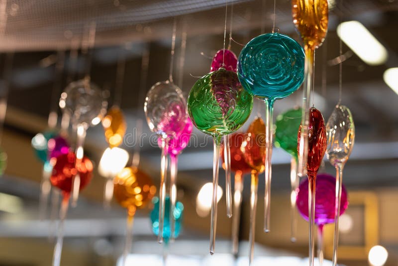 Round Glass Decorations in the Shape of Colored Lollipops Hanging from ...