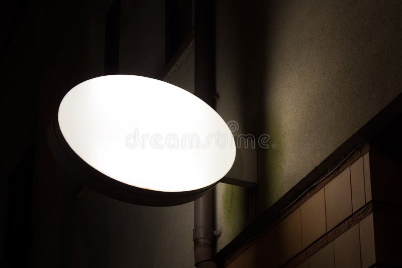 Round Glowing Billboard Hanging on the Wall Stock Image - Image of ...