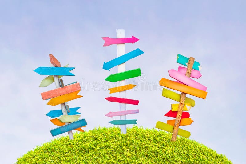 Round Grass Field with Empty Wooden Direction Signs Stock Image - Image ...