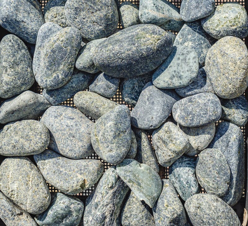 Round Gray River Stone. Lots of Stones in a Construction Sieve. the Use ...