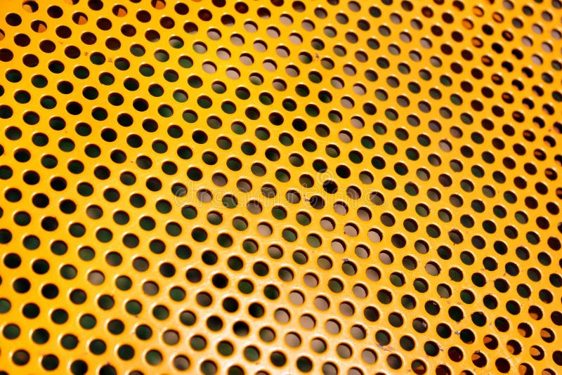 Round Holes in Yellow Perforated Metal Plate Stock Photo - Image of ...