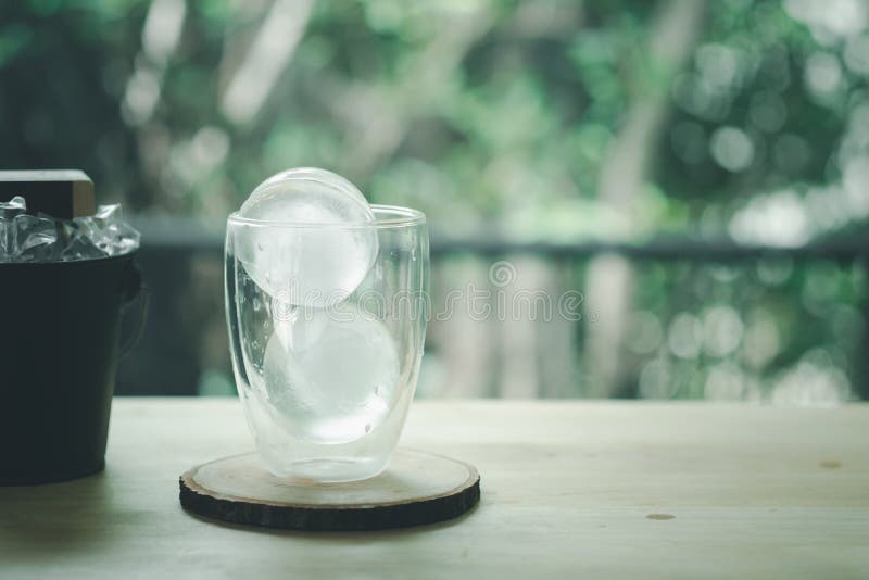 Round Ice in Double Wall Glass Stock Image - Image of abstract, color ...