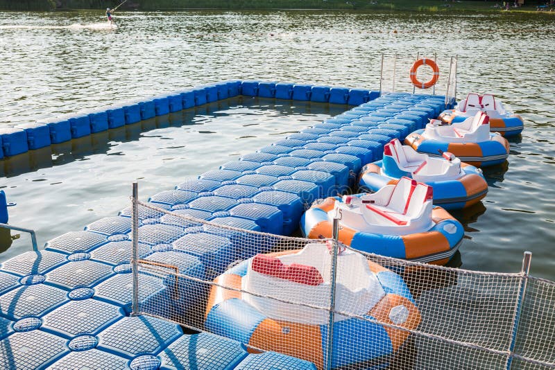 Round Inflatable Boat with Electric Motor Stock Photo - Image of orange ...