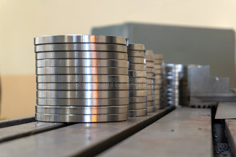 Round Iron and Flat Rings Lie on the Machine for Processing Stock Image ...