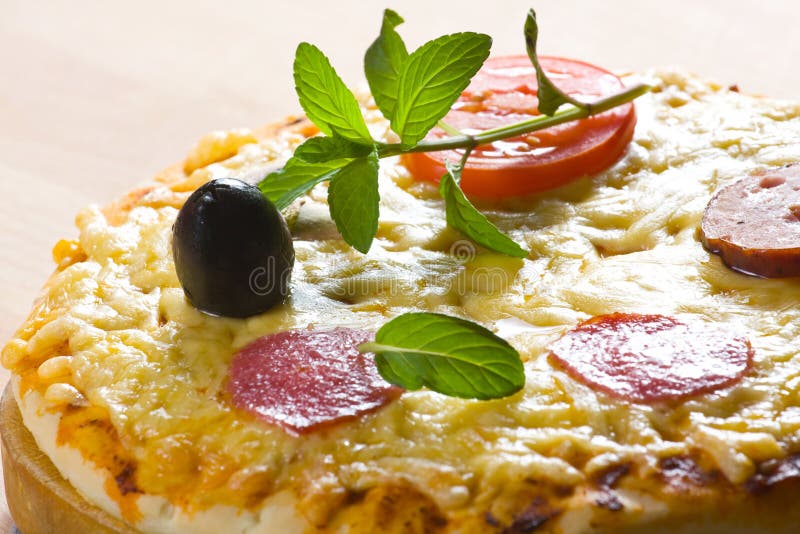 Round Italian Pizza with Salami, Olives and Cheese Stock Photo - Image ...