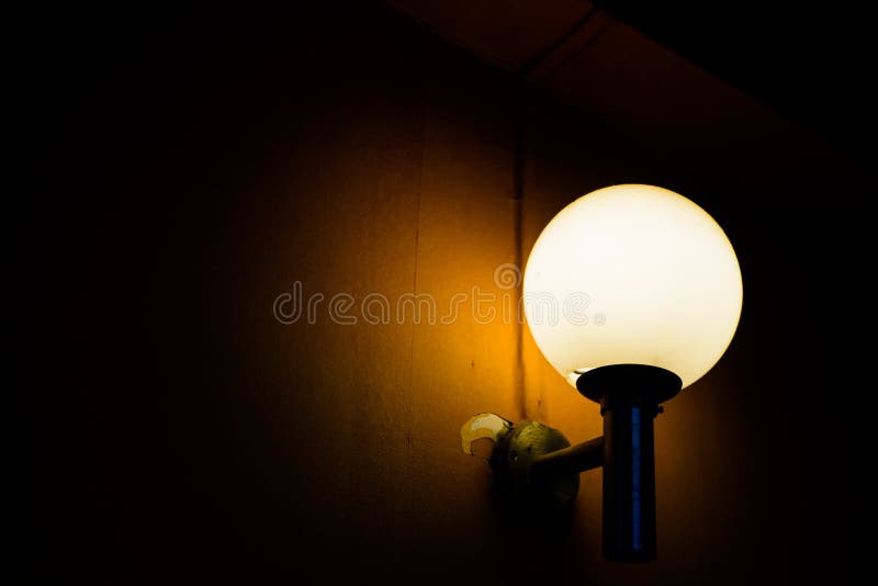 Round lamp beside a wall stock photo. Image of home, circle - 98305664