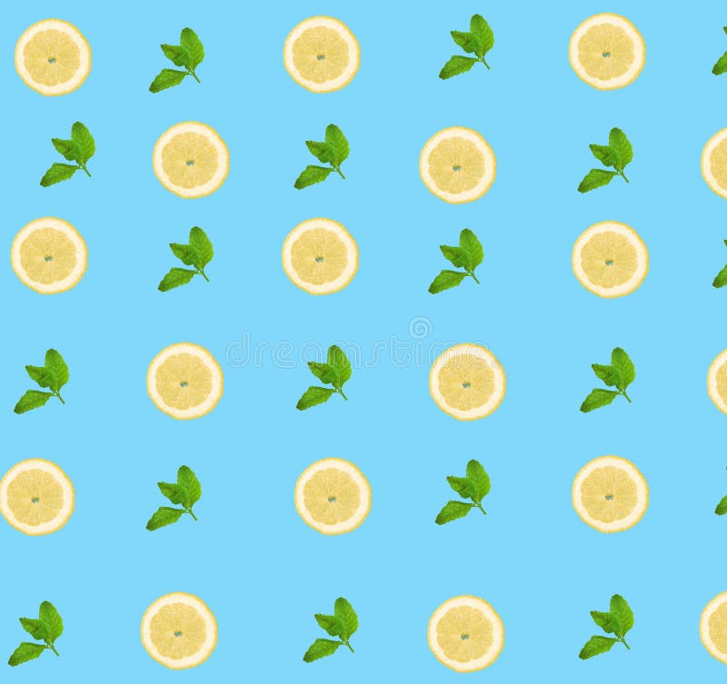 Round Lemon Slices Pattern with Mint Leaves on Blue Background Stock ...