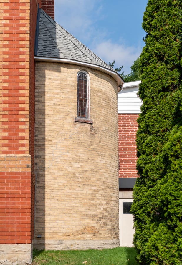 Round Light Coloured Brick Building Stock Photo - Image of house, blue ...
