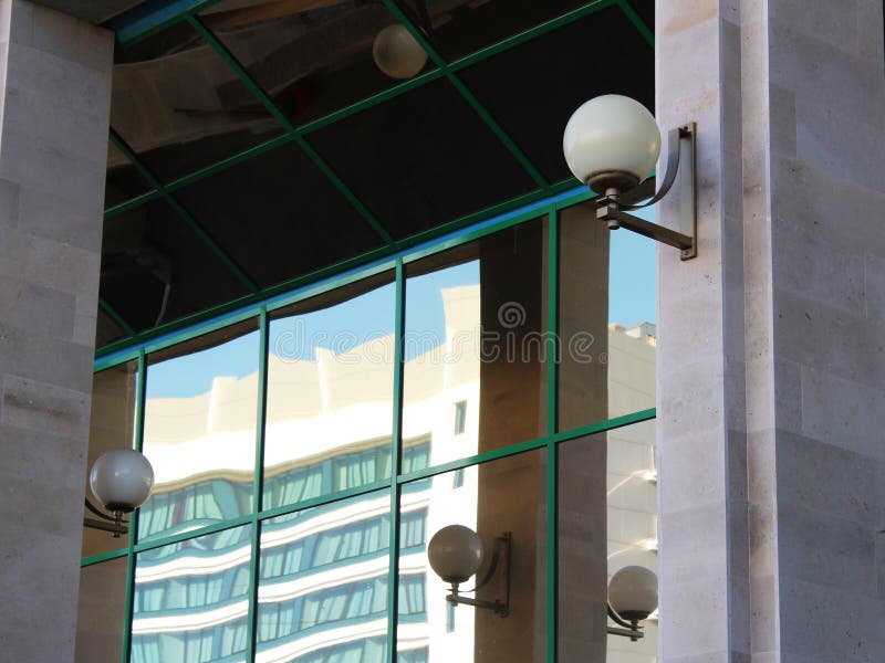 Round Lights on the Glass Facade of the Building Stock Photo - Image of ...