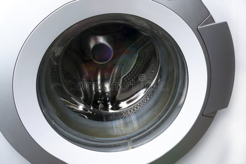 Round Loading Door of an Industrial Washing Machine in a Workshop ...