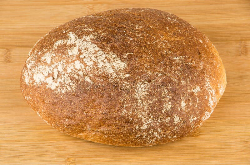 Round Loaf Made of Wheat and Rye Flour on Board Stock Image - Image of ...