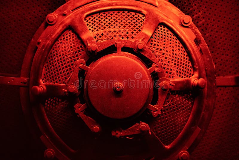 Round Machine or Bunker Door with Red and Dramatic Lighting Stock Image ...