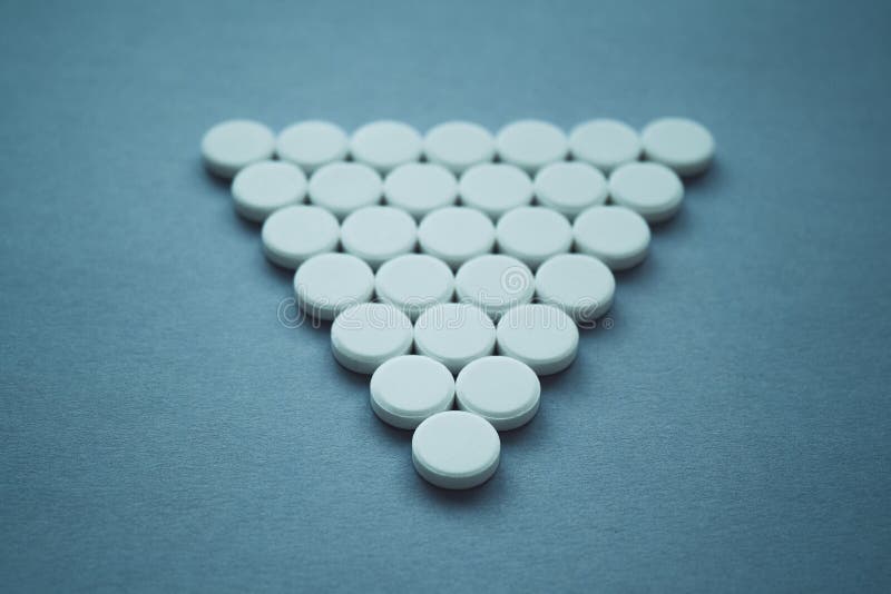 Round Medicinal Pills in Form of Triangles Stock Photo - Image of ...