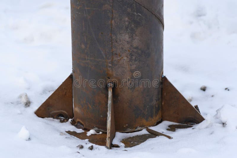 Round Metal Column Support on a Construction Site in Winter Stock Photo ...