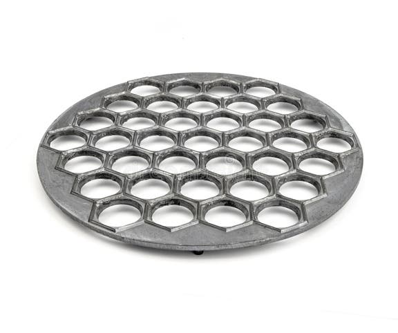 A Round Metal Mold with Hexagonal Indentations, Designed for Making ...