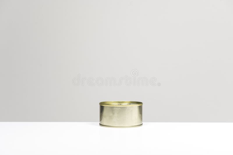 A Round Metal Tin with an Aluminum Nail for Easy Opening on a Smooth ...