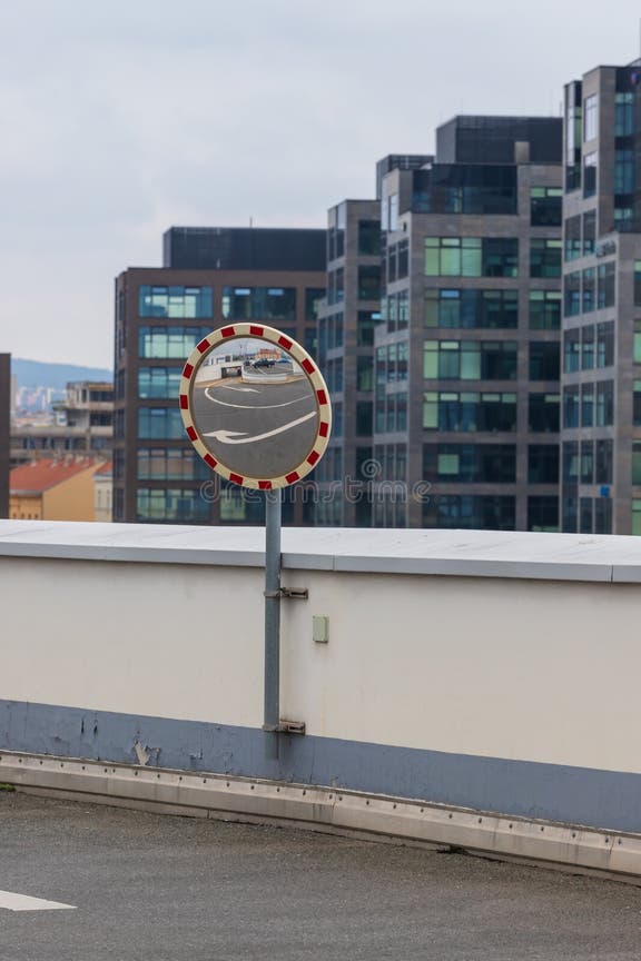 A Round Mirror on an Asphalt Parking Lot. Mirror for Safe Exit Stock ...