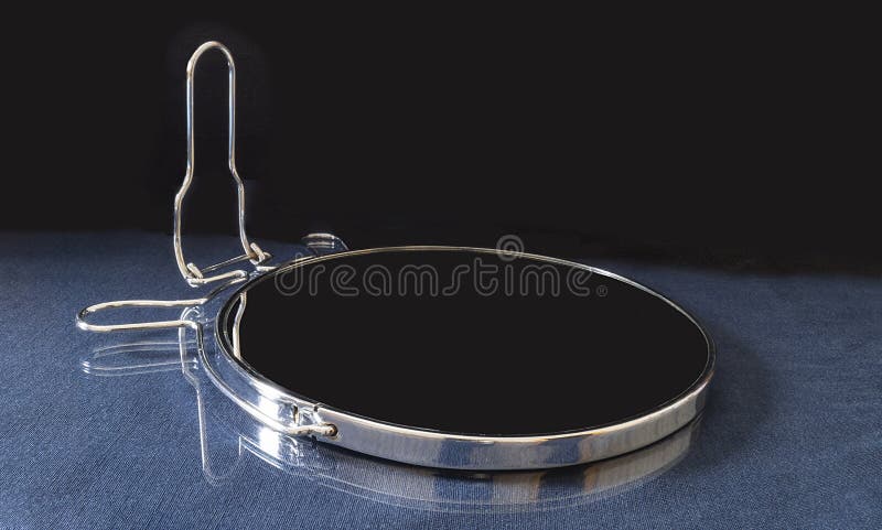 Round Mirror on Glass Table with Reflection Stock Image - Image of ...