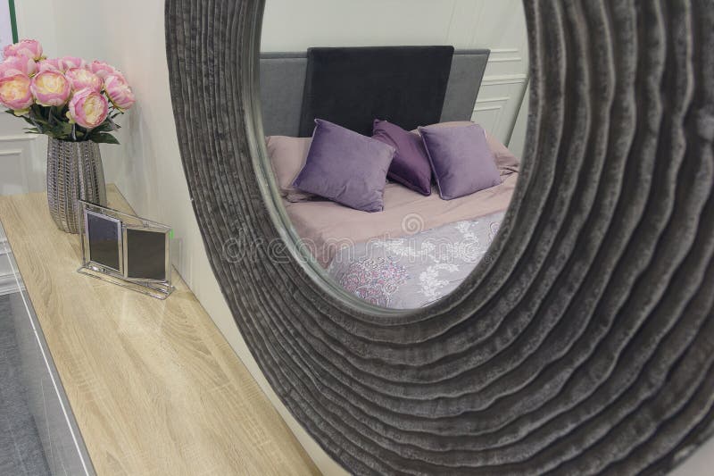Round Mirror in the Interior of a Bedroom Stock Image - Image of ...