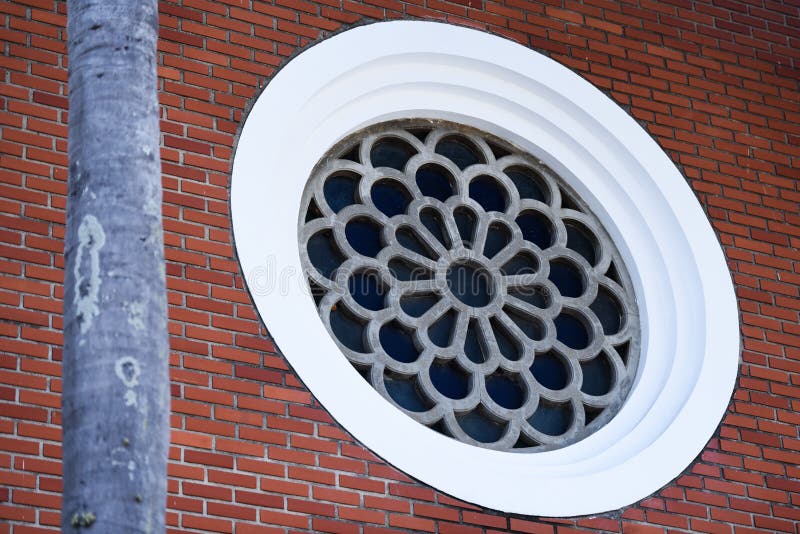 Round Mosaic Window in the Brick Wall Stock Image - Image of detail ...