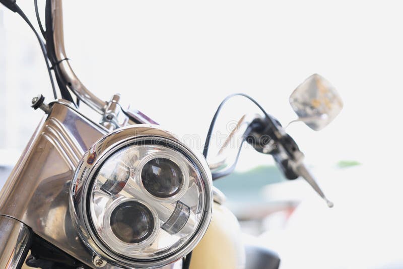 Round Motorcycle Headlight with Handlebars and Mirrors Closeup Stock ...