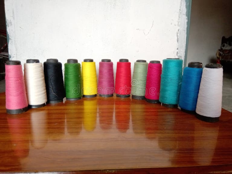 Sewing Threads, Stitching Threads, Tailoring Threads on Table Stock ...