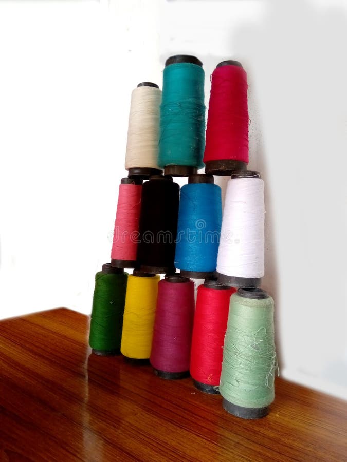 Sewing Threads, Stitching Threads, Tailoring Threads on Table Stock ...