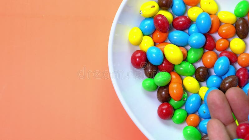 Round Multi-colored Sweets in a Bowl Stock Footage - Video of sugar ...