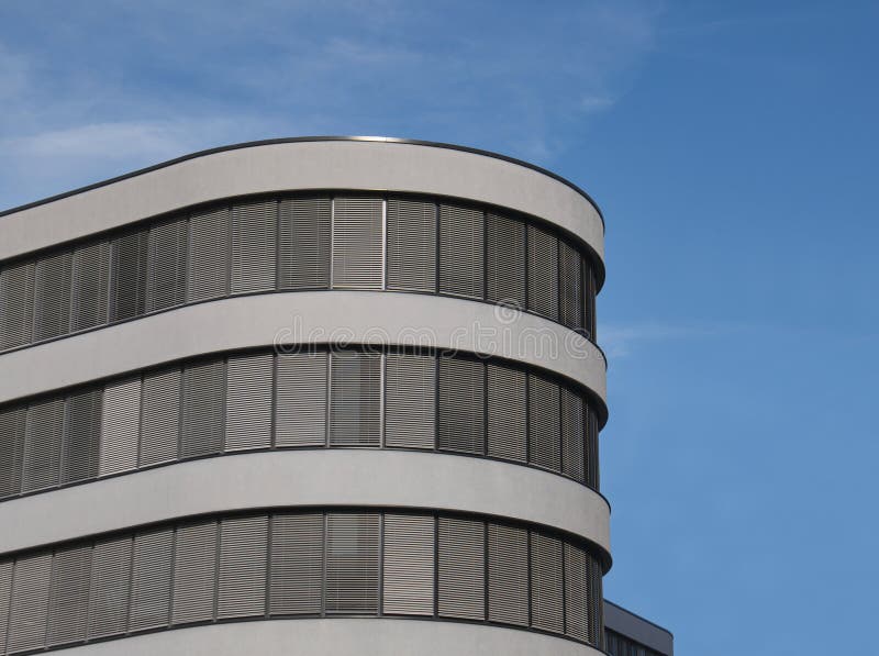 A Round Building with Blinds on the Windows Stock Photo - Image of ...