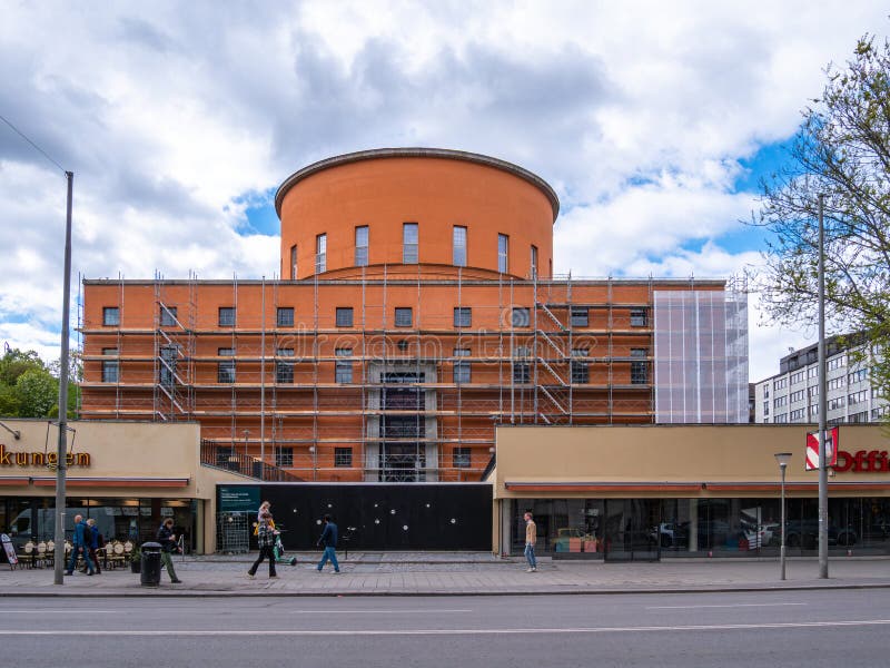 Round Orange Building Under Construction in Urban Setting Editorial ...