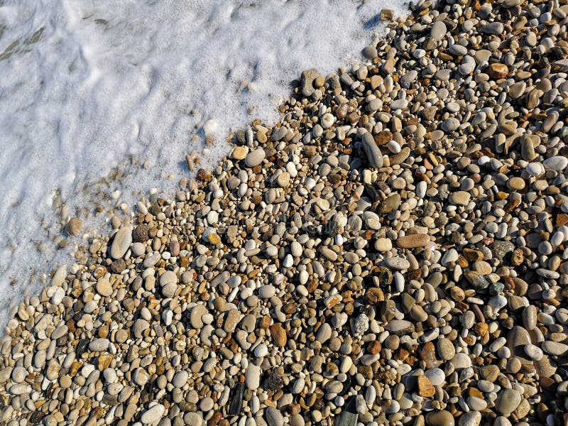 Round pebble beach stock image. Image of white, round - 141994177