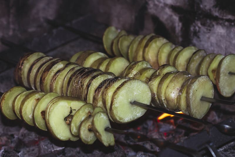 Round Pieces of Fried Potatoes on Skewers Stock Image - Image of ...
