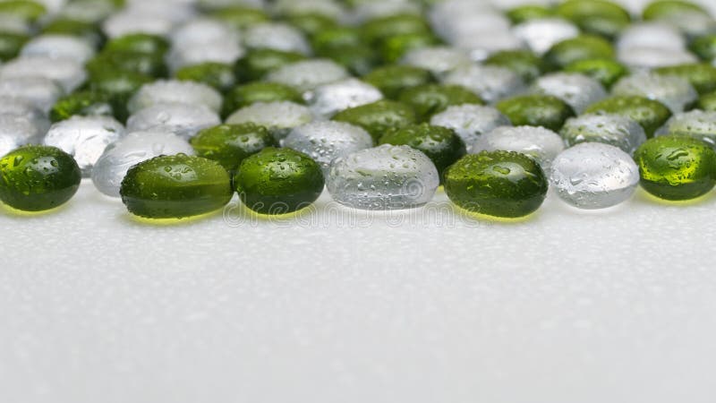 Round plastic pebbles stock photo. Image of color, green - 150907016