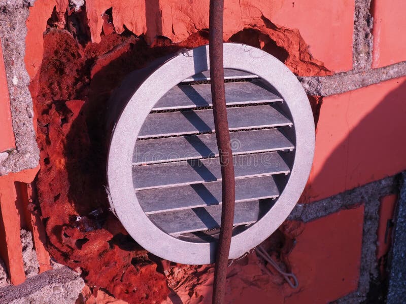 Round Plastic Ventilation Grate in the Brick Wall Stock Photo - Image ...