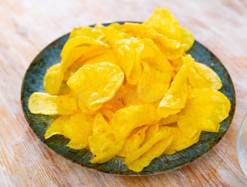 Round Plate of Potato Chips in Restaurant Stock Photo - Image of snack ...