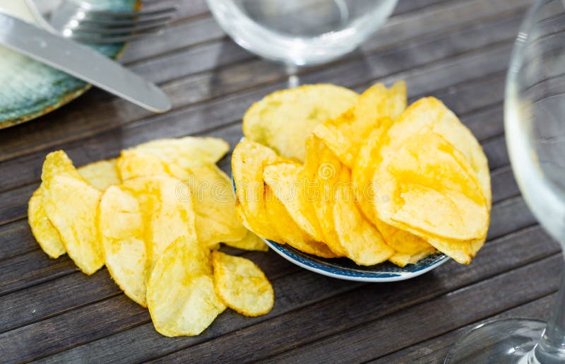 Round Plate of Potato Chips in Restaurant Stock Photo - Image of snack ...