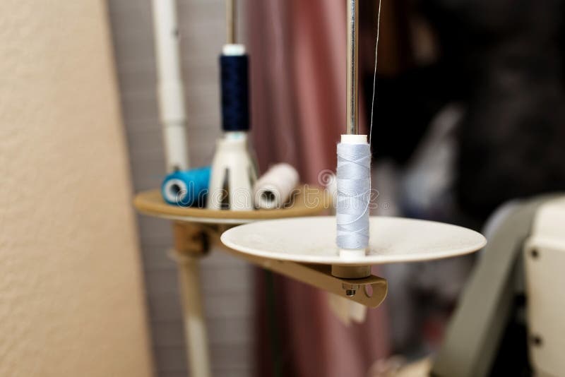 Round Plates of Sewing Machine with Spools of Threadsloaded into ...