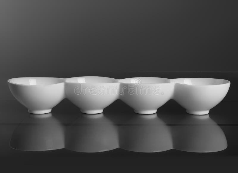 Round Porcelain Bowl with Four Compartments. Front View Stock Photo ...