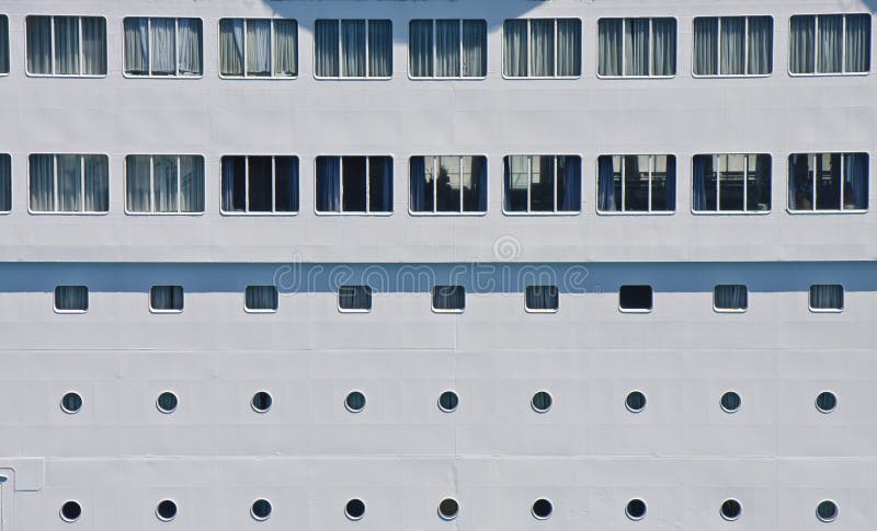Round Portholes Under Swuare Windows Stock Image - Image of travel ...