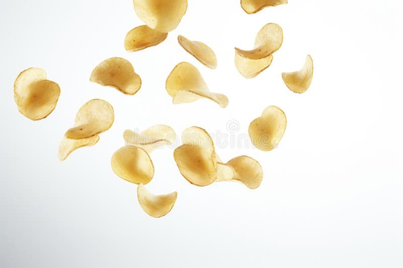 Round Potato Chips with Spices Fall in Pile on Light Gray Gradient ...
