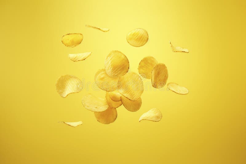 Round Potato Chips with Spices Fall in Pile on Yellow Gradient ...