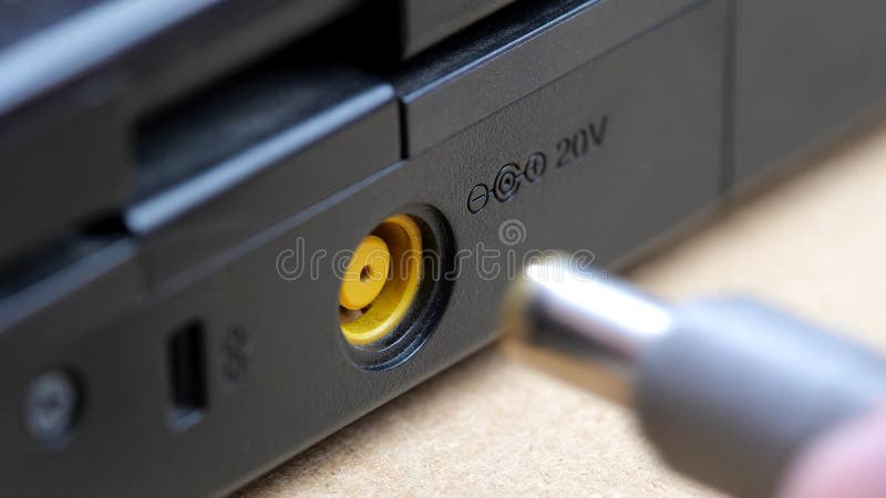 Round Power Adapter Plug about To Be Inserted into the Power Supply ...