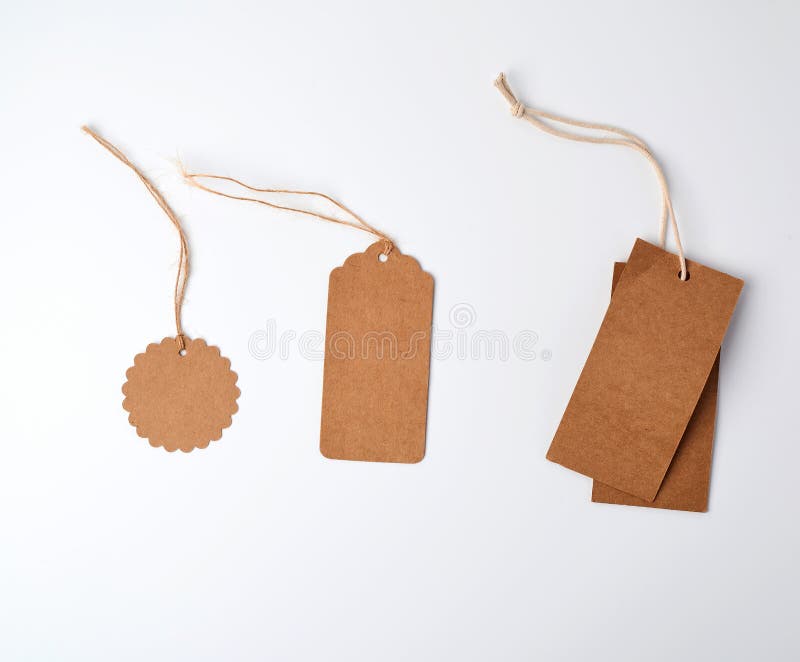 Round and Rectangular Brown Paper Price Tags Hanging on a Rope Stock ...