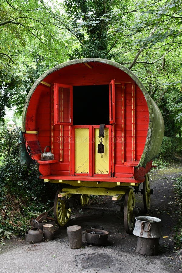 Red gypsy wagon in a park stock illustration. Illustration of vintage ...
