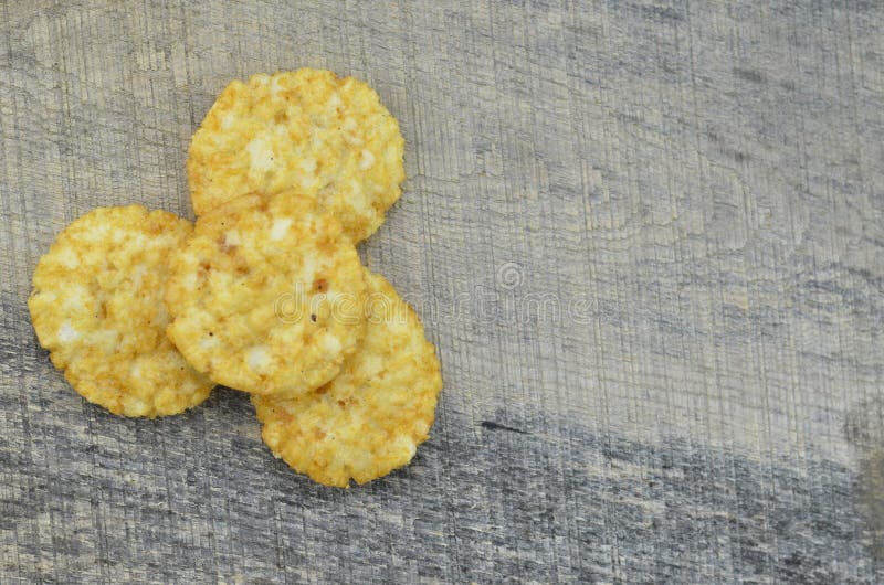 Round Rice Cracker on Wooden Background Stock Photo - Image of food ...