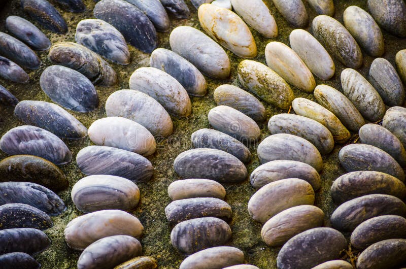 Round Rocks Arrangement on Cement Surface Texture for Decoration. Stock ...