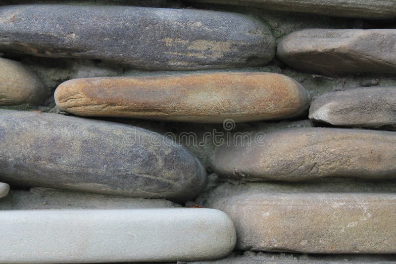 Round Rocks Fence. Pebbles Background Stock Image - Image of nature ...