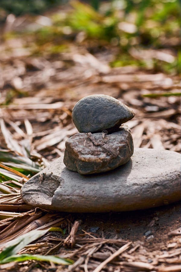 Round Rocks Stuck on Each Other on the Ground Stock Photo - Image of ...