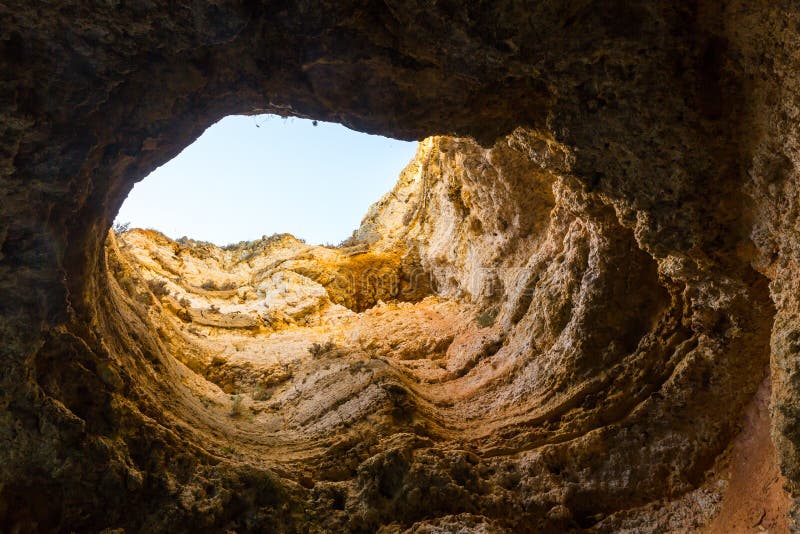 Round rocky cave stock photo. Image of natural, round - 61946496